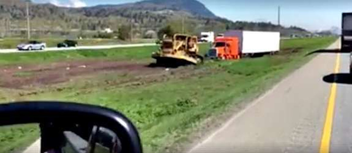 D9 dozer gives big rig a tow after getting it right-side up | Truckers News
