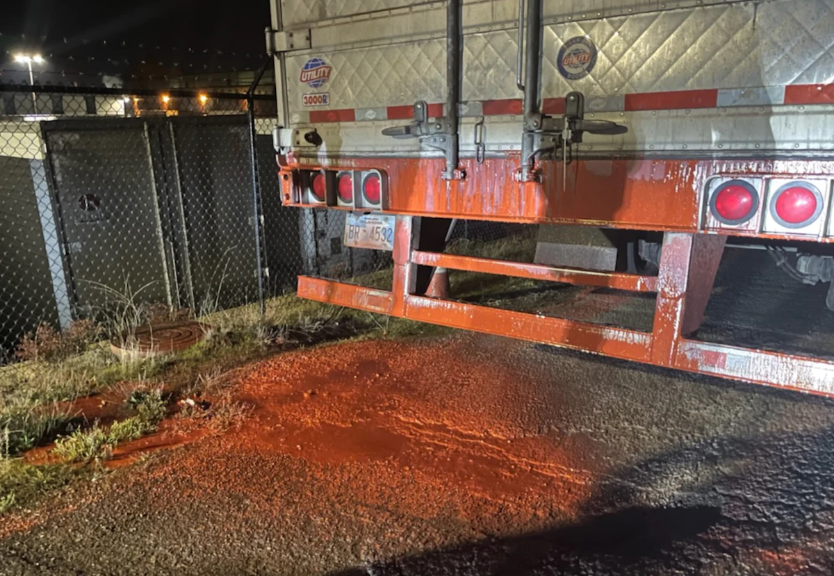 Trucker cited for driving while red dye leaked from his trailer in ...