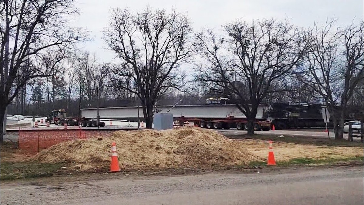 Video shows freight train plowing through truck carrying concrete beam ...
