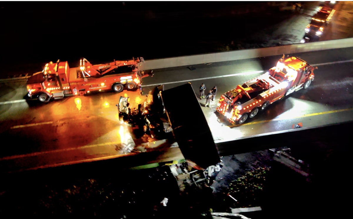 NY crash splits tandem tractor-trailer, leaves part handing off ...